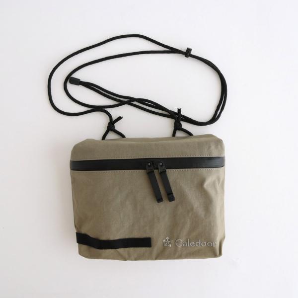 ■ブランド名：Caledoor カレドアー■商品名：Rambling Sacoche■型番：6053-1515■カラー：Beige■サイズ：ONE■カテゴリ：メンズ バッグ当店で取り扱う商品は全て正規品です。偽物・並行輸入品は取り扱っており...