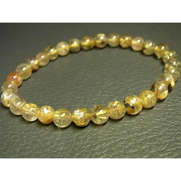 パワーストーン 天然石 ルチルクォーツ ブレスレット 限定1点 水晶 開運 金運　 ★サイズ：玉直径約6〜6.5ｍｍ腕回り約15.4ｃｍ重さ約10ｇ★商品状態：天然形成のギラギラと黄金色に輝くタイチンルチルがびっしり入っており、品質がよい開...