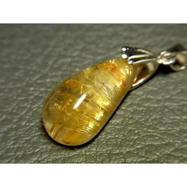 パワーストーン 天然石 ルチルクォーツ 水晶 ペンダント ブレスレット 限定1点 送料無料 ★天然石名称タイチンルチルクォーツ★<原石産地>：ブラジル★商品の説明タイチンルチルクォーツは、最高のエネルギーを持つ特殊な金色を放つ貴...