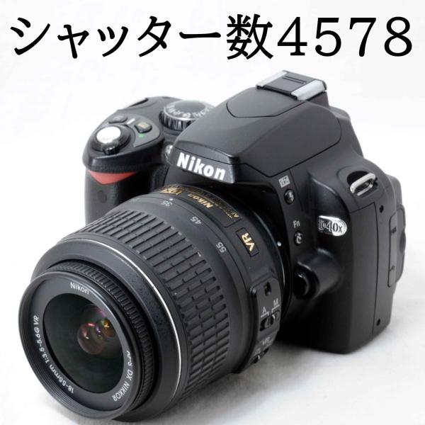 Nikon ニコン D40x小型軽量なデザインで入門機に最適！今では貴重なCCDセンサーを搭載しており発色が濃い目でコントラストが自然な描写を楽しめます！レンズは軽量で扱いやすい標準ズームレンズ！しかも手振れ補正付き！SDカードもお付けしま...