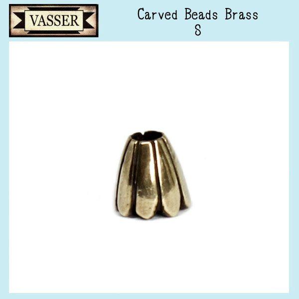 正規取扱店 THREE WOOD。素材：BRASSサイズ：縦約8.5mm，最大幅約8.5mm，穴最少径約3.5mmネイティブテイストに彫り込まれたビーズ、その使い方は幅広く、ブーツのカスタムや、パーカーの紐にアレンジ、バッグやウォレットやラ...