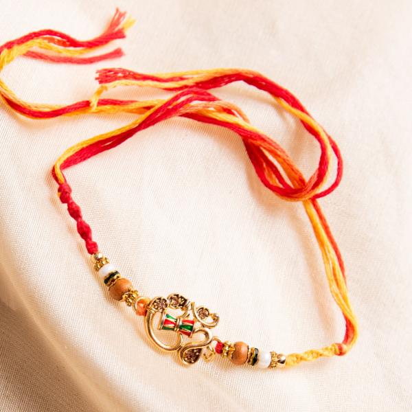 【発売日：2025年09月26日】ラーキー - インドの紐ブレスレット　シヴァのダマルーとオーム / ブレス、ブレスレット、アンクレット、ラクシャバンダン、Rakhi、Raksha Bandhan、ラーキー、ギフト、ヒンドゥー教、紐ブレスレ...
