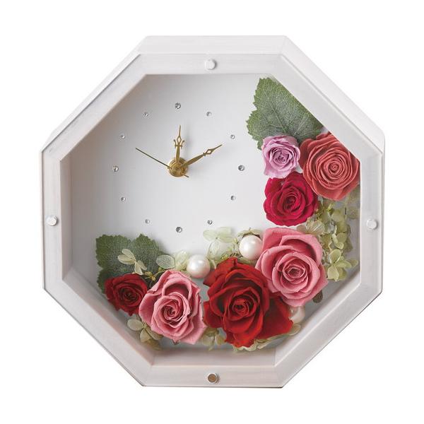 情熱的な真っ赤なバラや上品なピンクのバラに華やかなパールボールを添えて、清楚な印象のホワイトの時計の中にアレンジしました。可愛く上品な時計を見るのが楽しくなります。■プリザーブドフラワー(バラ、アジサイ)、ソーラーローズ、フェイクグリーン、...
