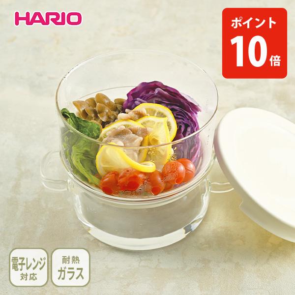 上下ともに耐熱ガラス製の「ガラスの蒸し器」。電子レンジで一度に2つの調理が同時に作れてとても便利です。上ボールには4つの穴が開いています。耐熱ガラス製なのでお手入れも簡単です。届いたその日から使える、オリジナルレシピ付きです。