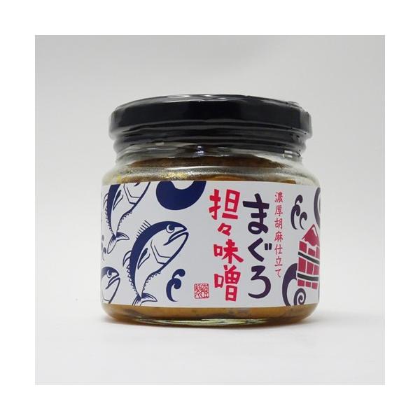 まぐろの旨味と胡麻の風味が効いたほどよい辛さの濃厚坦々味噌です。製造者　:　株式会社　安曇野漬物　(長野県安曇野市)原材料　:　味噌、砂糖、まぐろ、大豆たん白、ねりごま、水あめ、コチュジャン、豆板醤、ごま、野菜スープ、生姜、小麦粉、かきエキ...