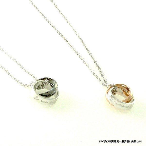 フランス語で”Je suis heureux d'etre avec vous”【一緒にいるだけで幸せ】と刻まれたリングタイプネックレス。２つのわっかが連なり、文字とブラックやゴールドのデザインが楽しいです！■素材：silver925■ブラ...