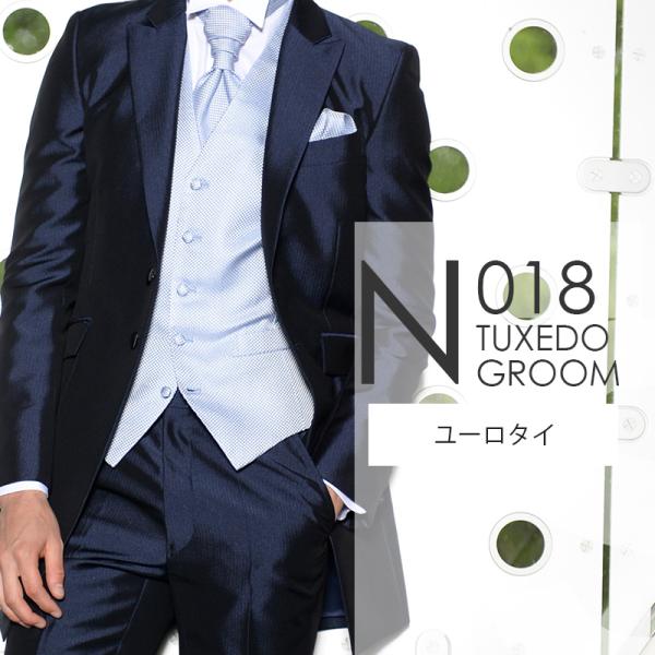 ネイビーのロングタキシード。スタイリッシュなウエディングシーンに、高級感あふれる良質なスタイルをご提案。待望のスリムシルエットがタキシードステーションに登場。フィットした肩回りと強調されたウエストシェイプ、ノータックで足長効果のあるパンツシ...