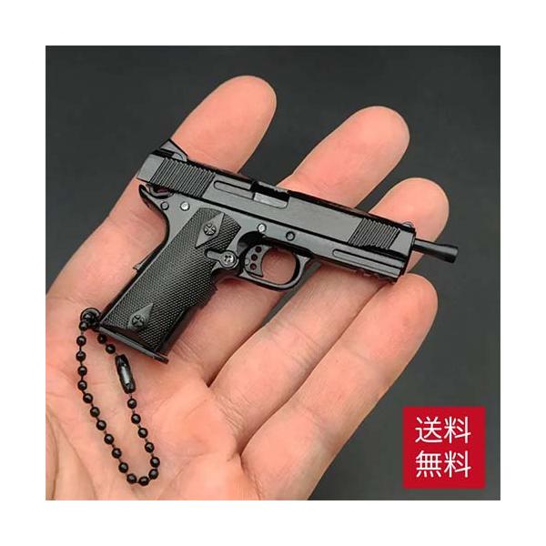 ●ミニガバメントM1911キーホルダー Ver2です。●以前に入荷したものより精度が上がりました。●メタル製で高級感があります。(55g) 刻印なし●ギミック：スライドします。ハンマー、トリガーが引けます。セーフティーが効きます。スライドス...