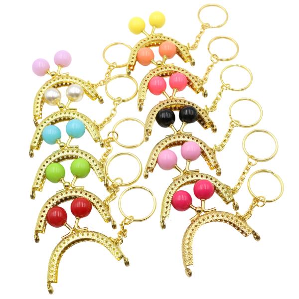 あめ玉がかわいい がま口です。ポーチ、小物入れ、お財布のハンドメイドに！型紙などは付属しておりません。■サイズ全長: 縦54mmｘ横53mm口金幅: 5cmリング直径: 25mmチェーン長さ: 約30mmあめ玉サイズ：直径14mm開閉の硬さ...