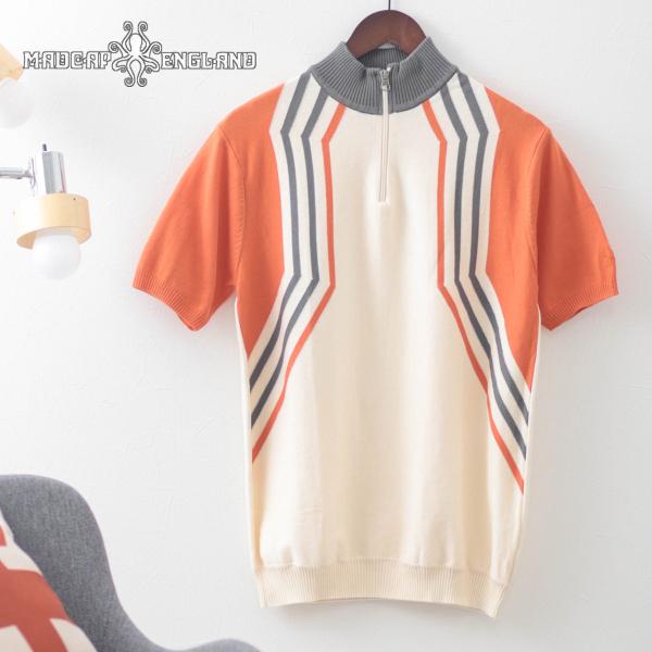 スペシャライズドにモッドアンドレトロ本気の60'sスタイルブランドMadcap Englad マッドキャップ イングランドのファネルネックニットサイクリングトップです。カラーはクリーム色に爽やかなオレンジが映えるデザイン。レトロな変形ストラ...