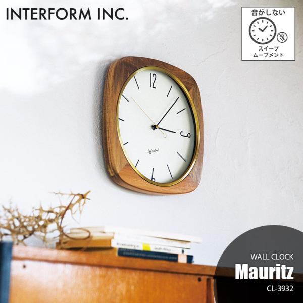 中央にゴールドのリングをあしらったどこか懐かしい印象の壁掛け時計です。木のフレームにアールを持たせることでナチュラルで親しみやすい仕上がりになりました。直線ではなく、ふくらみを持たせたスクエアフォルムの木製フレームが家具のような存在感を放ち...