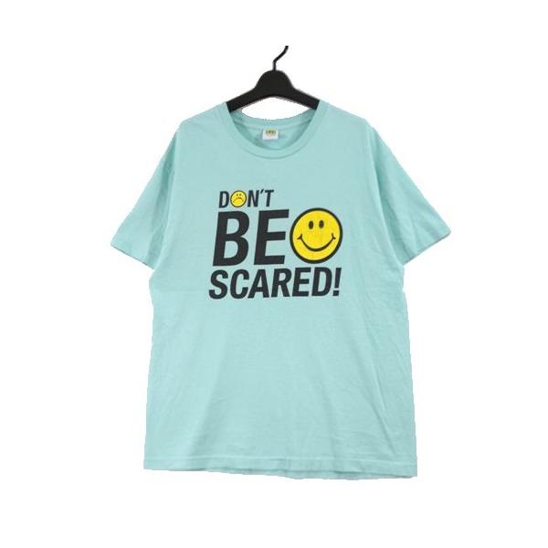 サイズ：表記L-肩幅53cm、身幅55.5cm、着丈71.5cm、袖丈21cmカラー：グリーンコンディション：Cランク-プリントひび割れ、バック上部・フロント中央下付近シミ素材：-コメント：IRAK アイラック 21SS SCARED TE...