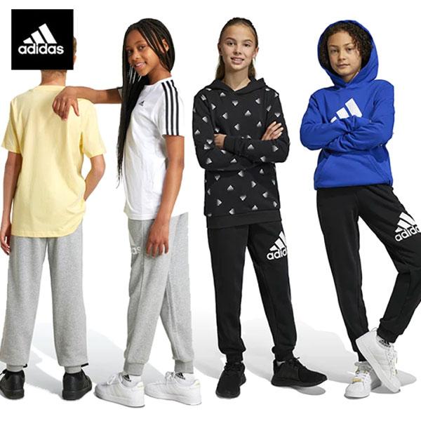 このジュニア用ミッドライズパンツは、シルクのように滑らかな肌触りが特徴のコットンとポリエステル混紡のフレンチテリー製。シンプルにウエストのドローコードを締めるだけでフィットする、どこにでもはいて行ける汎用性の高さが魅力。脚に配した大きなアデ...