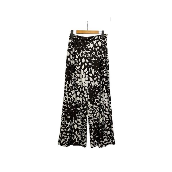 ジェニー GENNY パンツ 総柄 8 茶 ブラウン 白 ホワイト レディース【ブランド】ジェニー GENNY【表記サイズ】8【実寸サイズ】ウエスト：64cm　もも幅：30cm　裾幅：32cm　股上：29cm　股下：70cm　　【素材】写真...