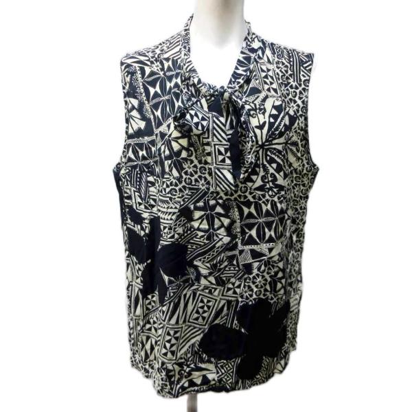 マリナリナルディ MARINA RINALDI MARINA SPORT 総柄 チュニックブラウス リボン ボウタイ ノースリーブ アイボリー ブラック 系【表記サイズ】23【実寸サイズ】身幅：57cm　総丈：67cm　　【素材】レーヨン1...