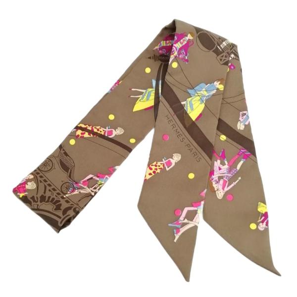 エルメス HERMES Ex-Libris Les Parisiennes エクスリブリス パリジェンヌ ツイリー リボン スカーフ 美品 ブラウン系 レディース【ブランド】エルメス HERMES【実寸サイズ】全長/約86cm　幅/5cm　...