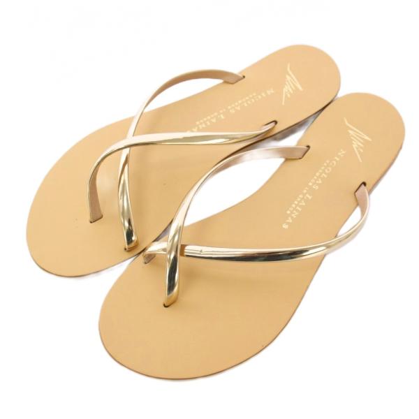 ニコラスライナス NICOLAS LAINAS トングサンダル フラット クロス バイカラー 36 ベージュ ゴールドカラー /BB レディース【表記サイズ】36【実寸サイズ】ヒールの高さ：約1.3cm　最大幅：約9cm　　【色】ベージュ ...