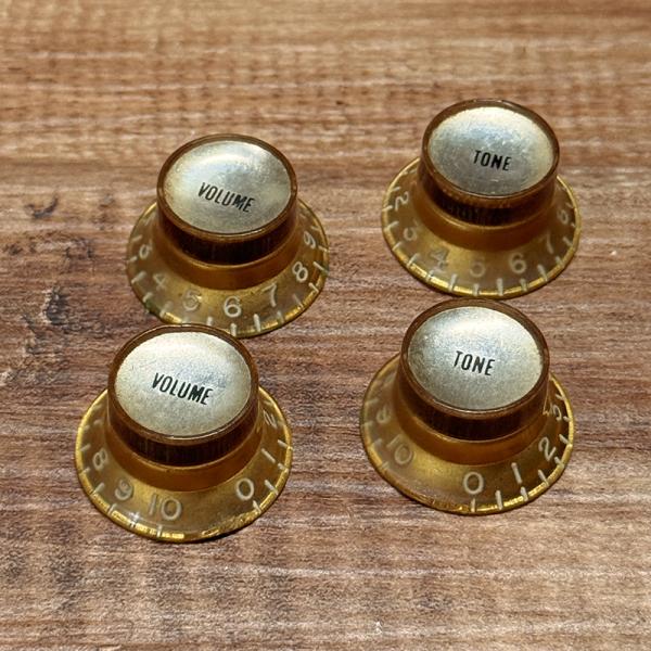 ギブソンの1960年代初期ゴールド・リフレクター・ノブ・セット。1960年代のLes Paulモデル、Firebird、Melody Maker、ESモデル等で使用されたメタルトップノブやメタルインサートノブとも呼ばれるVOLUME x 2...