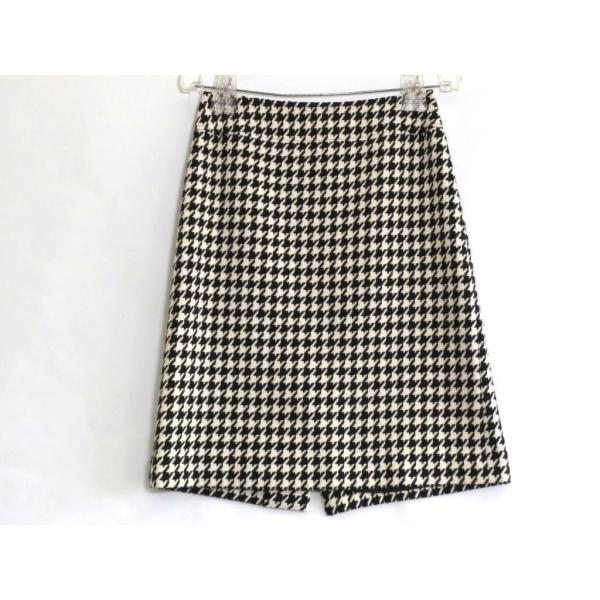 BURBERRY LONDON バーバリーロンドン【商品名】千鳥格子　ウール　膝丈　スカート FX073-819-09【カラー】アイボリー|ブラック【サイズ】サイズ表記 ： ・38ウエスト(平置) ・35 着丈 ・57【素材】・画像参照【季...