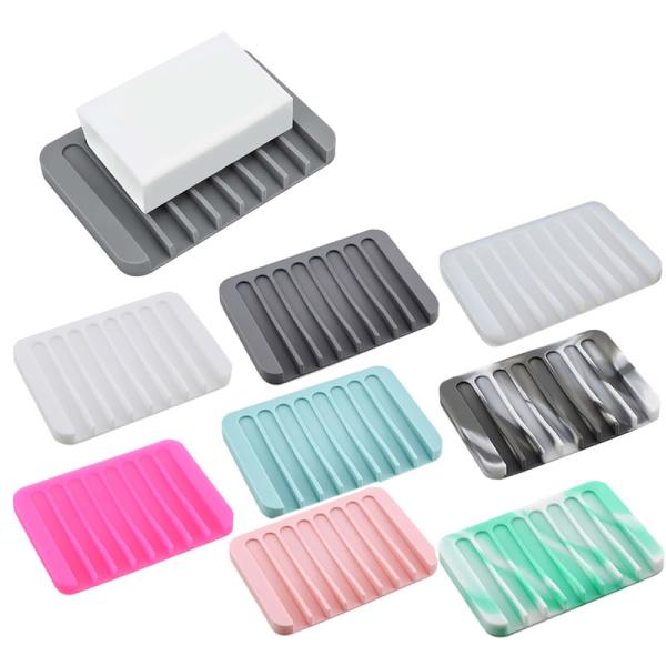 シリコン素材！水が流れる石鹸トレイ。シンプルかつ機能的。洗面台のふちにかけておくと、溜まった水滴を自然に排水し、石鹸がはやく乾くので溶けにくく長持ち。ボトルやスポンジを置けば、底の水垢やぬめりをおさえ、清潔に保ちます。シリコン製は滑りにくく...