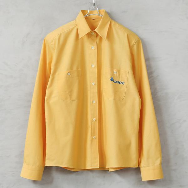 ■商品説明スペインの郵便事業を担うCorreos コレオスの歴史は古く、その起源は1716年にさかのぼります。こちらのロングスリーブシャツは1990年代から2010年まで使用されていたデザインになります。よって、製造年代もおおよそ20年間と...