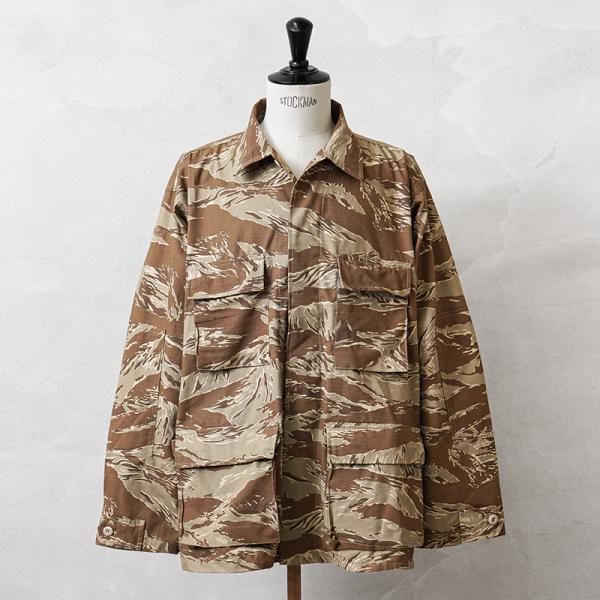 ■商品説明2000年代頃に米軍の民間モデル（Commercial Model）として耐久性の高いジャングルファティーグジャケットやコンバットパンツを生産していた実績で知られる、米国アラバマ州ピードモントを拠点とする、ハンティングウェアやミリ...