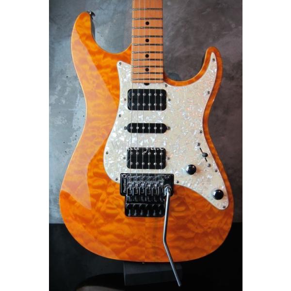 Suhr Standard 2002 Trans Honey Amber H-S-HBody: Swamp Ash, 2-PieceTop: Quilt MapleBinding: Scraped BindingPickguard: Whi...