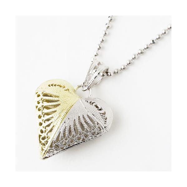 熟練職人(DANILO MINGALDI)による手作りペンダント。■イタリア製■素材：シルバー925（ゴールド、ロジウム仕上げ）●大きさ約18mm×18mm●チェーンの長さ約50cm、引輪式