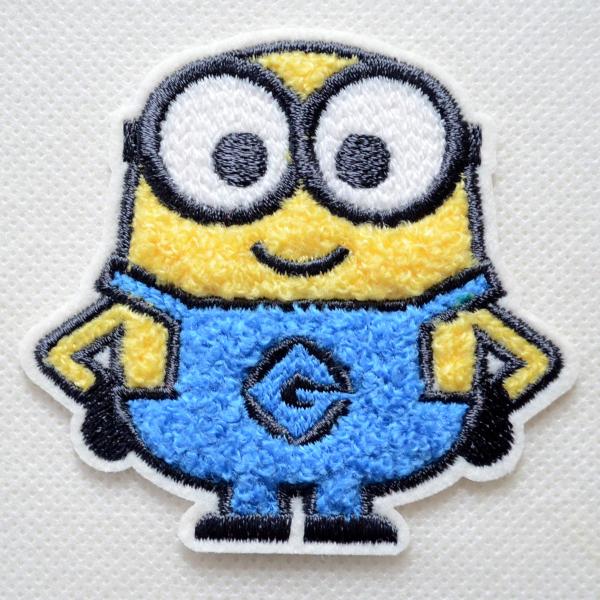 大人気のキャラクター“ミニオン”のオフィシャル刺繍シールワッペンです。ミニオンズでおなじみのキャラクター、ボブのワッペン！モコモコとした毛糸のような太い糸をフェルトの上に刺繍しています。フェルトと太い刺繍糸の組み合わせによる、立体感とあたた...