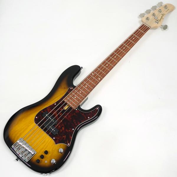 本機はアッシュボディ、メイプルネック、パーフェロー指板を採用したアクティブ5弦モデル。PBスタイルながらピックガードはピックアップ回りのみで、バックキャビティからコントロールにアクセスしやすい設計。34インチスケールの400R指板ラジアス、...