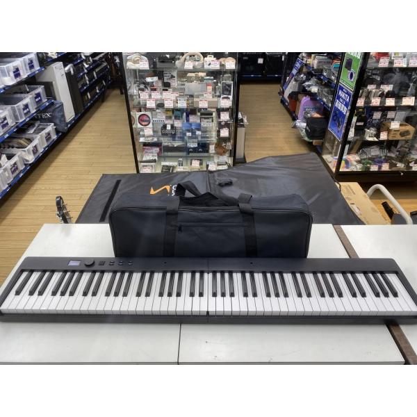 フルサイズの88鍵盤を備えた折りたたみ式充電ピアノ128種類音色/128種類リズム/20デモ曲内蔵MIDI対応・USB端子・ペダルポート付属品：取扱説明書,本体カバー、譜面立て、サスティンペダル、イヤホン※主な付属品を記載するようしておりま...