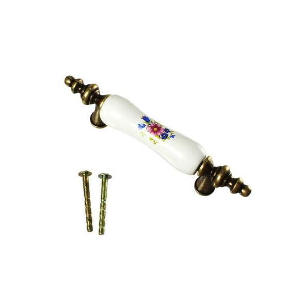 引き出しや扉の、お手軽な模様替えにオススメです。家具タンスの取っ手・ツマミシリーズ家具扉・引出等の取っ手。裏側からビスで止めるタイプの取っ手です。■サイズ：76mm■取付：裏ビス止■カラー・仕上：ゴールド/ホワイト(花柄)■本体：亜鉛ダイカ...