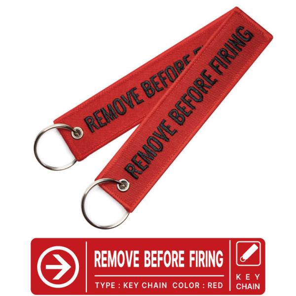 REMOVE BEFORE FIRING【発射する前に外してください】カラー レッド（1個）メール便 送料無料 ※画像は裏表です。定番のキーチェーンタグシリーズ。バックに付けてもＯＫちょっとしたアクセサリやプレゼントに是非どうぞ。商品説明名...