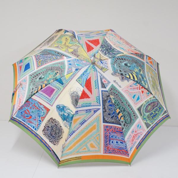 ★商品詳細★USED品ですが、比較的綺麗な一品です。「オモシロオカシイ」をテーマにメイドインジャパンのストールを提案するブランド「Drole2（ドローレドローレ）」の、アーティスティックなアンブレラです。様々なパターンを組み合わせたデザイン...