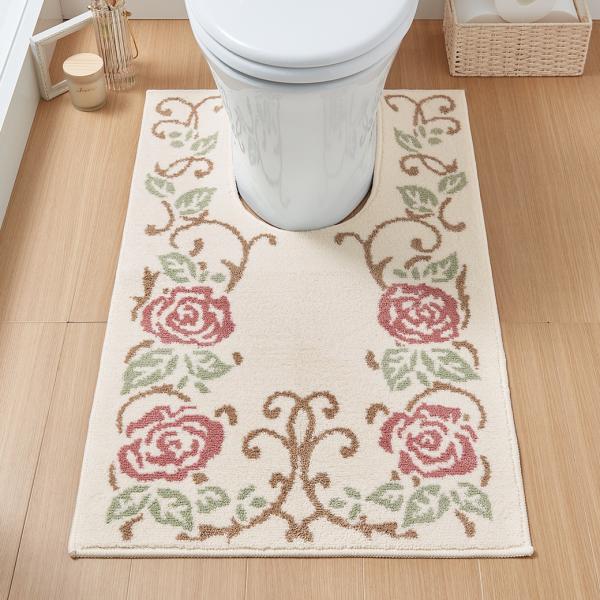 高級感のあるエレガントなバラデザイン肌ざわりの良いカットパイルのトレイマットです。清潔感のあるホワイトベースでバラが咲くお庭のようなエレガントなデザイン。奥行もフロント部分も長いトイレマットです。裏面すべりにくい加工。●サイズ/フロント：約...