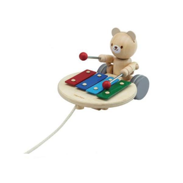 引っ張るとクマがシロフォンをたたくプルトイです。ひもを横に引っ張ると、別の鍵盤をたたきながら進みます。