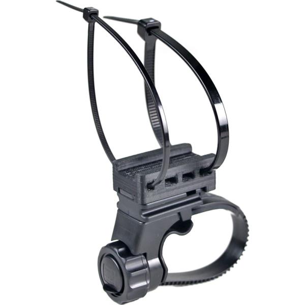 キャットアイのフレックスタイトブラケットに、好みのバッテリーやライトが取り付けられるアダプター アウトドア用品ととして販売されている、マグライトやシュアファイヤーなどの丸い断面のライトを、CATEYE（キャットアイ）のブラケットスペーサーに...