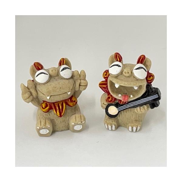 お茶目でかわいいシーサーの置物です。赤・黒・ピンクの3色からお選びください。名称：置物シーサー原材料名：合成樹脂サイズ：高 約3.5cm、幅 約2.5cm販売者：株式会社南西産業沖縄 お土産 通販 お取り寄せ ギフト