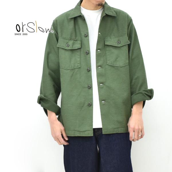 オアスロウからU.S.ARMYのシャツをベースに制作された、オリーブのミリタリーシャツ。オアスロウを象徴するファティーグパンツに用いられている、オリジナルバックサテン生地を使用。横ムラが強く、厚手なバックサテンは、使い込めばまた風合いを変え...