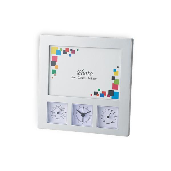 ワイドフォト クロック サーモ　大判の写真（サイズ：102×148mm）が入れられるマルチクロックです。■商品詳細●現品約18×4.3×18cm●ABS樹脂●時計、温度計、湿度計、フォトフレーム、アラーム　●単3電池×1（別売）●写真サイズ...