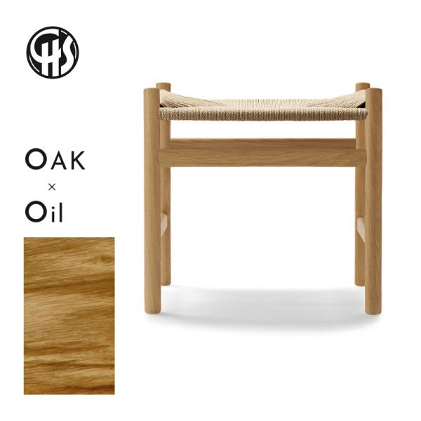 ハンス J. ウェグナーが1966年にデザインしたCH53 フットスツールは、優れたクラフトマンシップと実用性が見事に融合した一脚です。堅牢な FSC認証オーク材のフレーム に、手編みのナチュラルペーパーコードを使用した座面を組み合わせるこ...