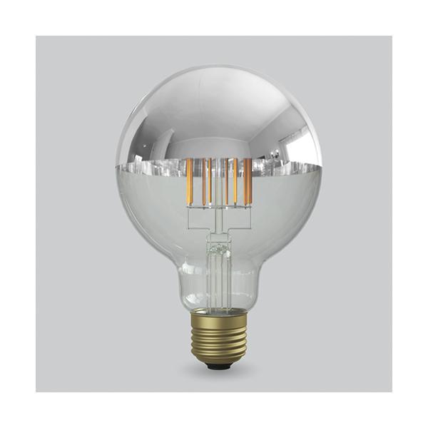 ハーフミラーやＴミラーとよばれている、電球のTOPが加飾されている電球です。加飾されている部分は光を通さず、直接見ても眩しくなく優しく光が拡散します。ガラス部が丸い形状のフィラメント電球です。LED電球をそのまま使用して形と灯りを同時に楽し...
