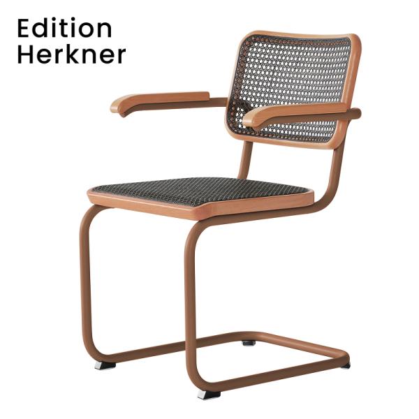 「Edition Herkner」のS64Vは、クラシックなカンチレバーチェアの現代的アレンジです。デザイナーSebastian Herknerが手掛け、座面には深みのあるダークメランジェカラーのケーン（籐編み）を用いた仕様です。フレームと...