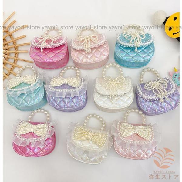 リボンが可愛い子供用のバッグですモデル情報：身長135cm 体重23kg  9歳バッグサイズ底辺13cm 高さ12cm 奥行き5cm肩紐115cm 重さ0.17kg生産国：中国素 材：綿他【注意事項】※商品のデザインはロット数、生産数によっ...