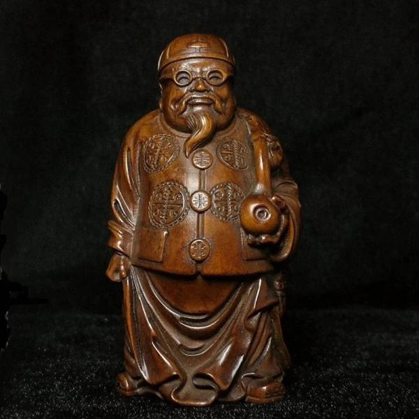 素材: 木 / サイズ: 高さ79mm 幅42mm 厚み34mm / 重量: 50g / 主題: 財神（富の神） / 製造地: 中国本土 / 注意: 天然木を使用しているため、色や紋様に個体差があります。乾燥した場所に保管してください。
