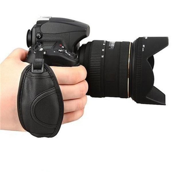 ハンドストラップグリップストラップカメラグリップベルト手首を完全固定!Canon/Nikon/Pentax/Sony/Panasonic一眼レフカメラ用【商品説明】各メーカー対応のレザー風のグリップベルトです。一眼レフカメラなどに取り付けら...