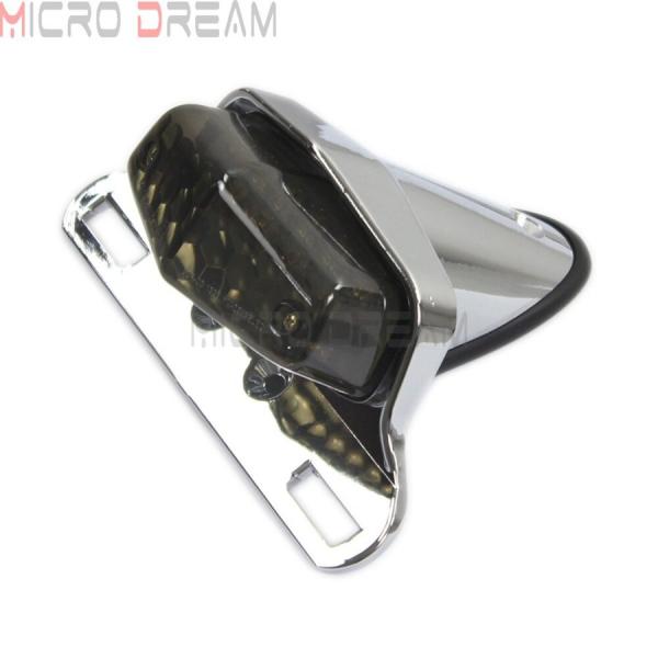 概要特徴:英国のカフェレーサーテールライト。これはナンバープレートマウント付きのルーカススタイルのテールライトアセンブリです。同様のライトがトライアンフにあります。表示されているものすべてが付属しています + LEDライト。これを取り付ける...