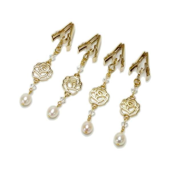 ※ご注意 ・ポスト配達便での発送なので、代引きでのお支払いは不可能となりますので、ご了承下さい。 ・ポスト配達便は発送してから2〜5日後に郵便受けに投函されます。 薔薇と淡水パールがエレガントなテーブルクロスウェイトクリップです。パーティー...