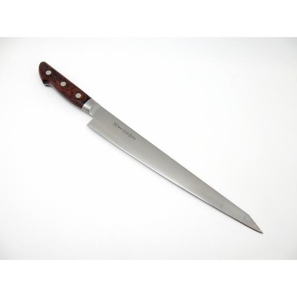 ブランド： 堺孝行（青木刃物製作所）モデル：青二鋼材質：安来鋼青紙2号刃渡：240 mm柄：茶合板特徴：和庖丁のプロ用に使われる安来青紙2号を採用した全鋼タイプの洋庖丁となります。※メイン画像は刃渡り270 mmのものとなります。
