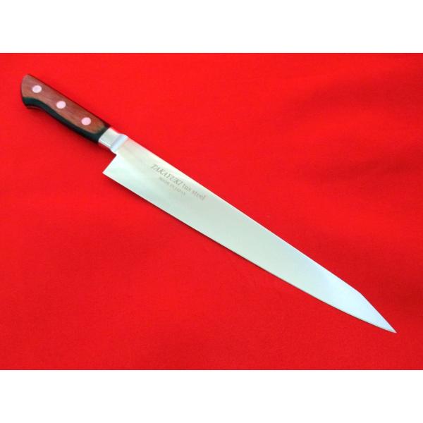 ブランド： 堺孝行（青木刃物製作所）モデル：TUS材質：ハイカーボンステンレス鋼刃渡：240 mm柄：木目調合板特徴：国産ステンレス鋼を正確な温度で熱処理する事により切れ味が鋭い包丁に仕上げました。高級感のある茶系合板を使用したやや軽量タイ...